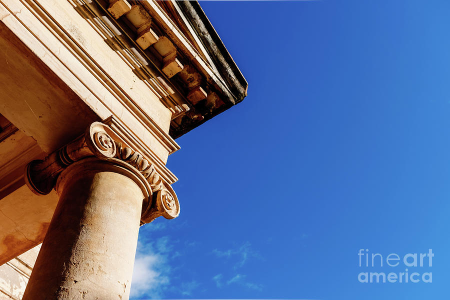 A portico with columns and a triangular pediment on the Greek-st Photograph by Joaquin Corbalan ...