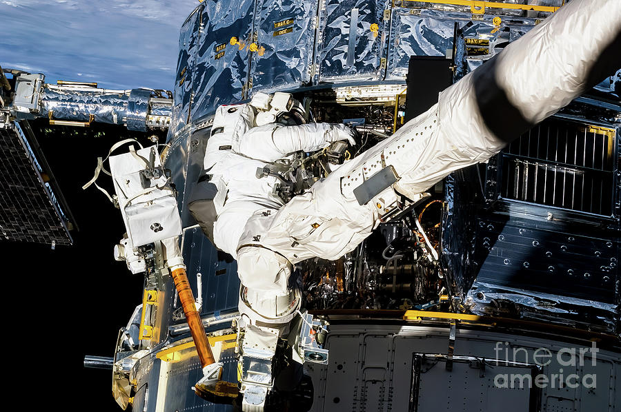 Astronaut Working in Space Photograph by M G Whittingham - Pixels