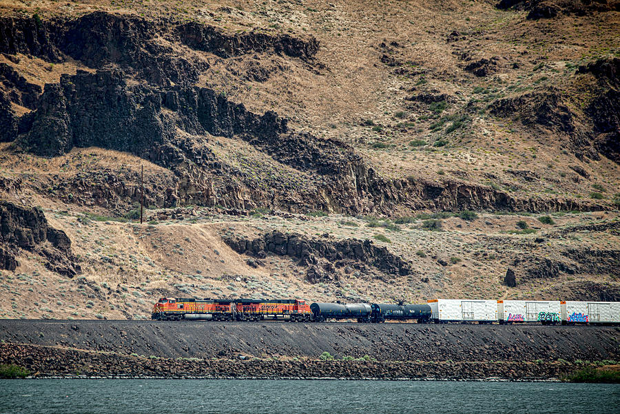 BNSF 5299 and 6859 lead a mixed freight along the Columbia River Photograph by Jim Pearson ...