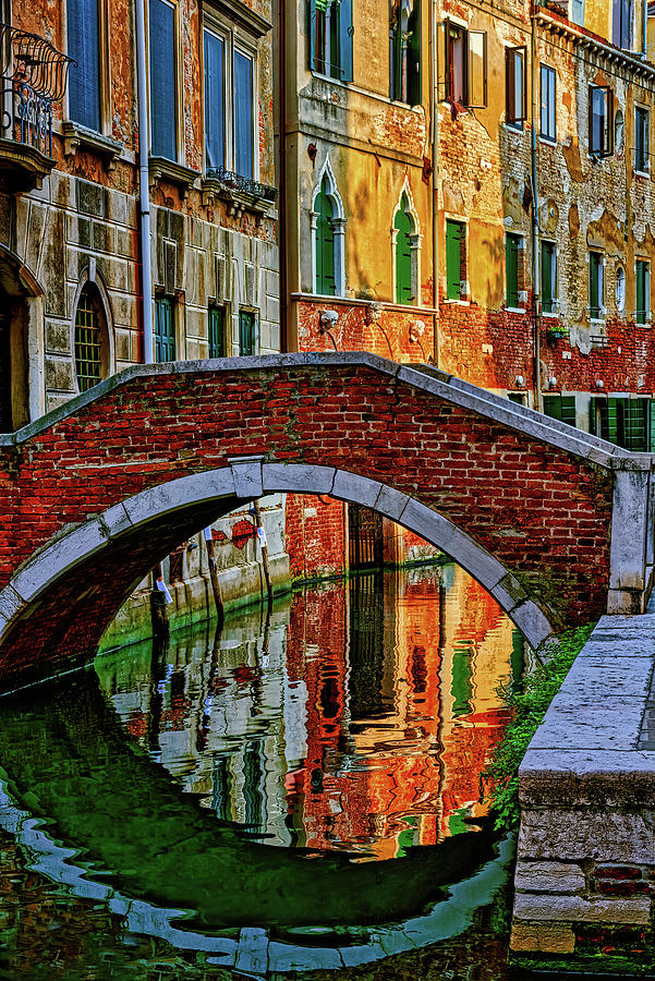 Bridge over narrow canal, with colorful reflections 2. Photograph by ...