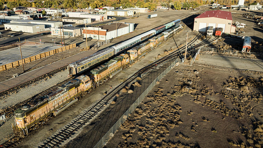 BUGX ex-BNSF power and coaches sitting in the Colorado Pacific Rio Grande Railroad Photograph by ...