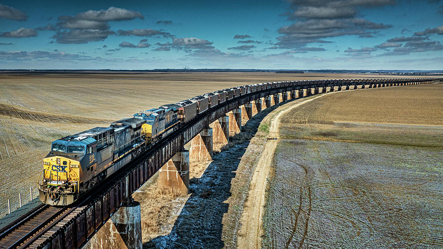 CSX C319 heads south up the viaduct at Rahm, Indiana Photograph by Jim Pearson - Fine Art America