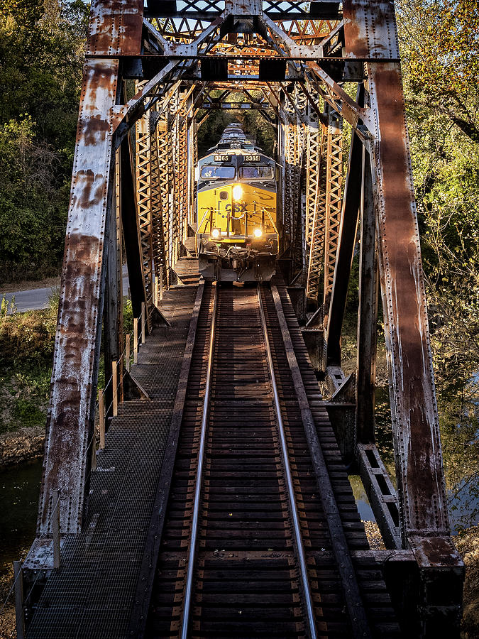 CSXT 3365 leads M513 as it creeps across the Patoka River at Patoka Indiana Photograph by Jim ...