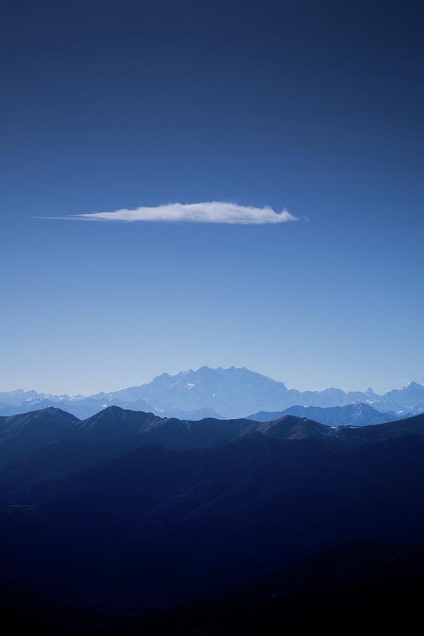 High-angle photography of mountains and clouds Photograph by Julien ...