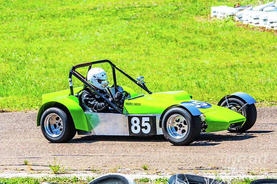 Open topped Sports car on race track, 4 Photograph by Christopher ...