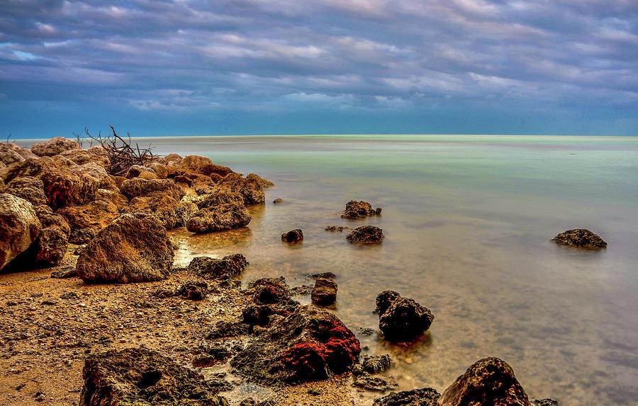 Rocky shore at Little Duck Key Photograph by Jesse Shaw - Fine Art America