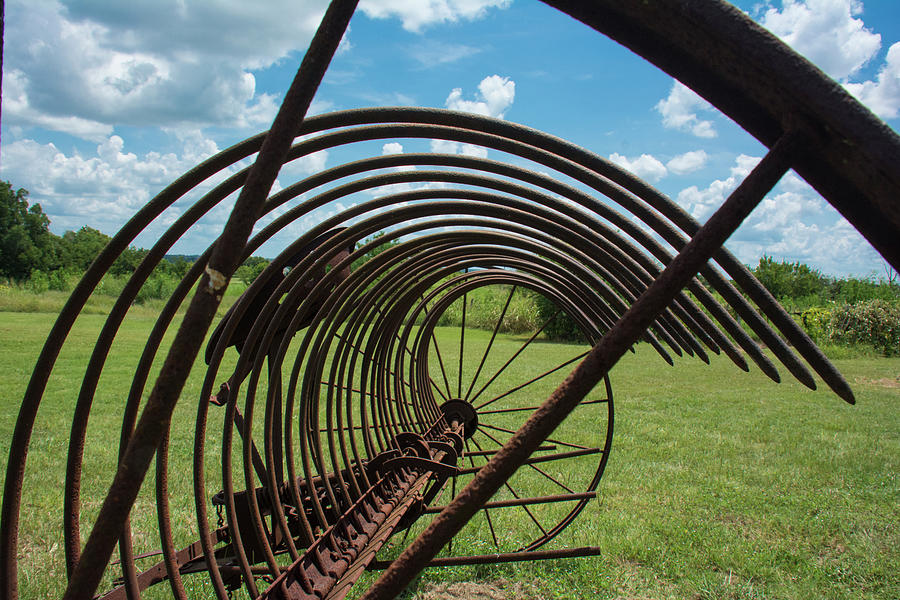Round shapes of this Old Hay Bale Rake Photograph by Brigitta Diaz ...
