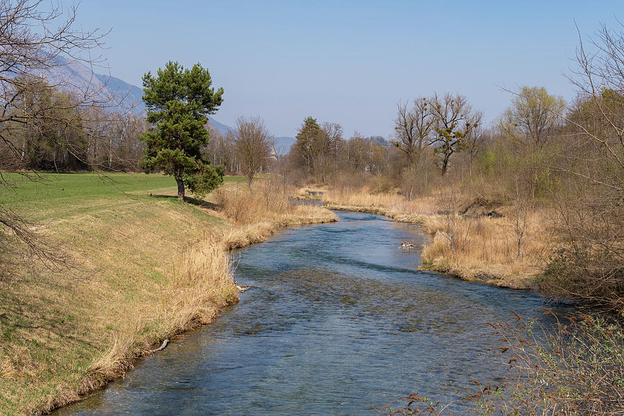 Small river flows through the nature in spring time in Bendern in ...