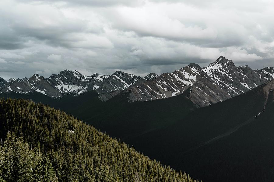 Snow-capped Gray Rocky Mountain Under Cloudy Sky During Daytime ...