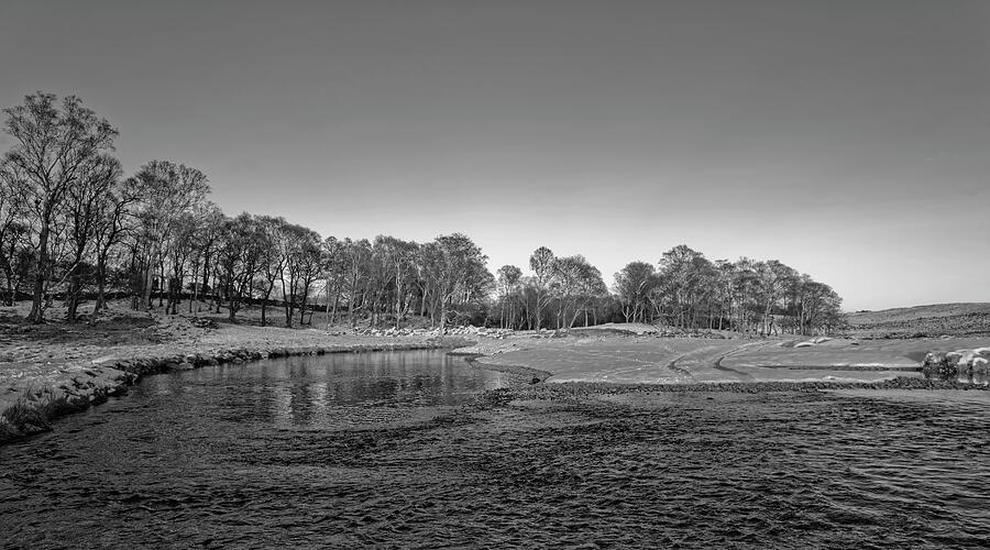 The outflow from Loch Esk forming the River North Esk as it makes its way down the Glens ...
