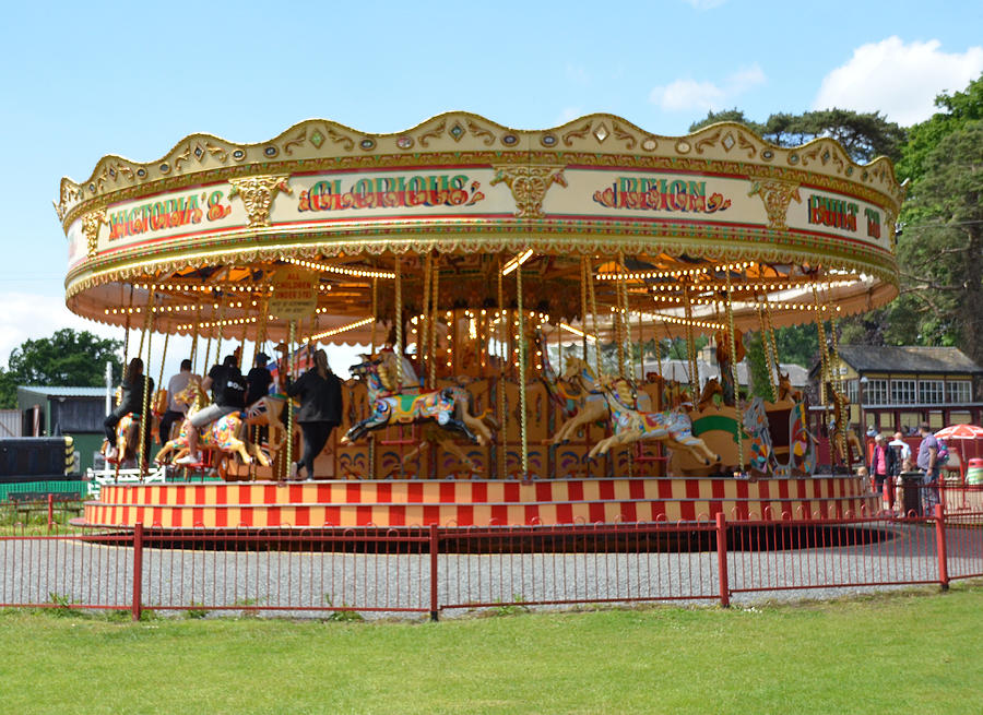Victorian fair carousel Photograph by Keith Jones - Fine Art America