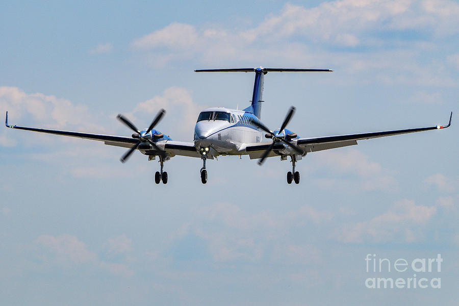 Wheels Down Photograph by Daniel Rodriguez - Fine Art America